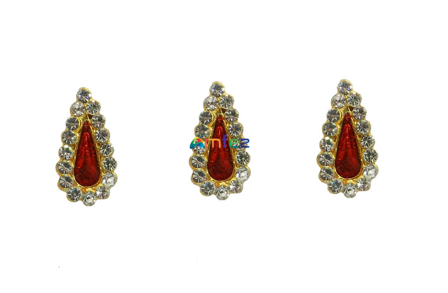 A Set Of Three Red Stone Work Tilak